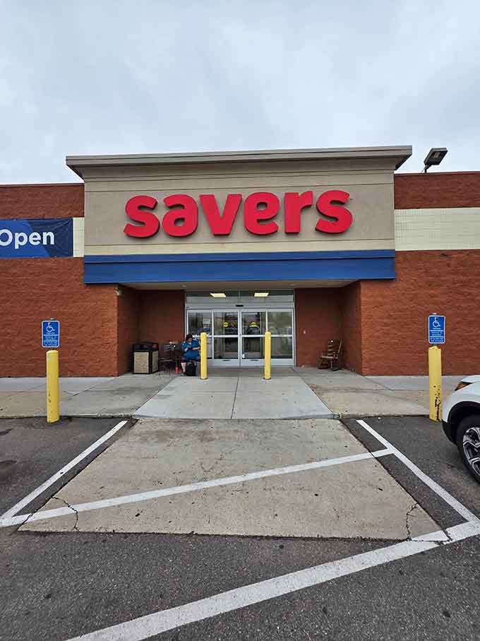 Bold red letters announce your arrival at this thrift shopping destination where deals await behind those glass doors.