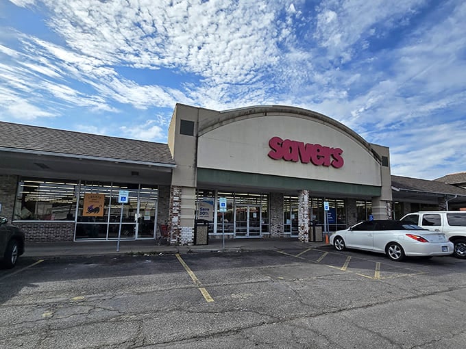 Savers' curved facade houses a universe of secondhand treasures under bright Kansas skies. Thrifting paradise found!
