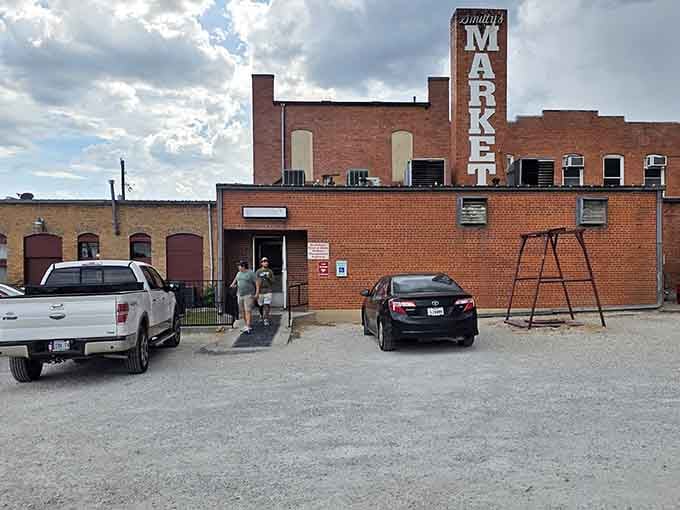 Smitty's Market stands like a time capsule of Texas BBQ tradition. That brick building has seen generations of smoke rings.