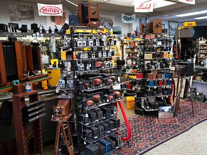 A camera collector's paradise packed floor to ceiling with vintage photography equipment from every era imaginable.