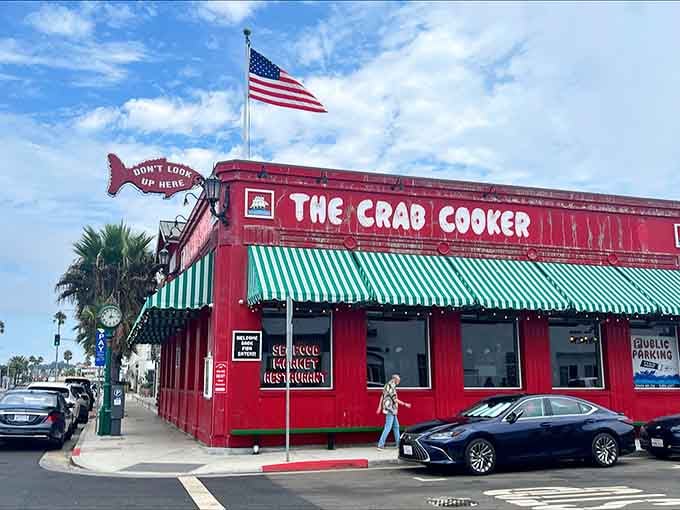 That "Don't Look Up Here" fish sign has been photobombing family vacation pictures since before Instagram was even a twinkle in technology's eye.
