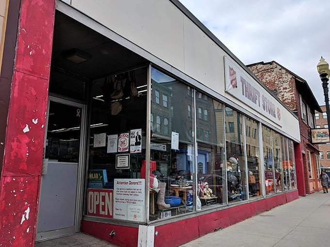 Those big storefront windows reveal the promise of bargains waiting inside this classic downtown thrift shop location.