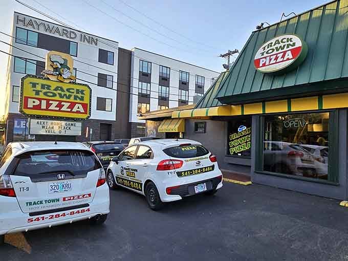 Track Town Pizza: Where Duck fans and pizza lovers unite! That vintage sign has probably witnessed more Eugene celebrations than a championship parade.