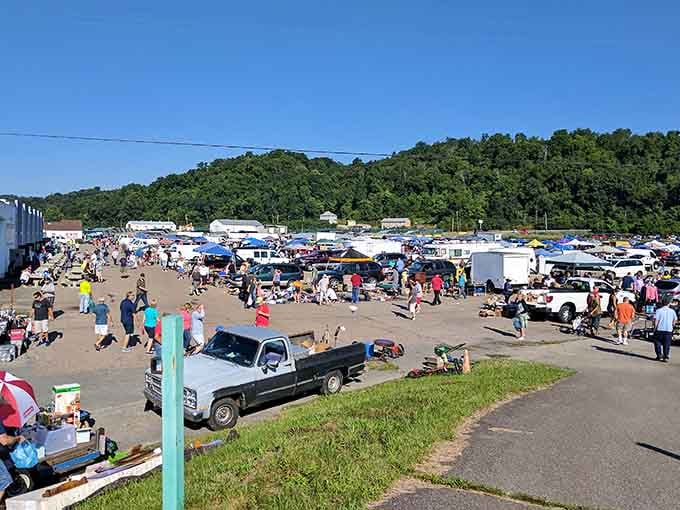 Nestled against green hillsides, this bustling market spreads across the landscape like a weekend adventure waiting to happen.