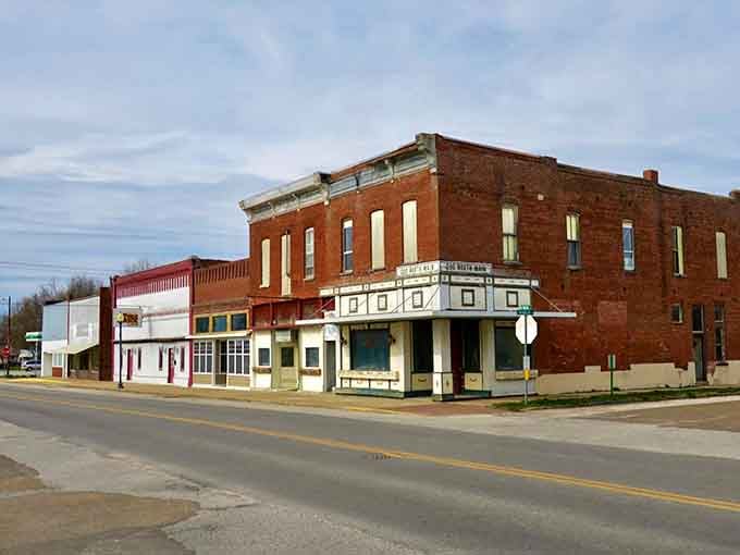 That corner building with the classic awning could be straight from "The Andy Griffith Show," minus the black-and-white filter.