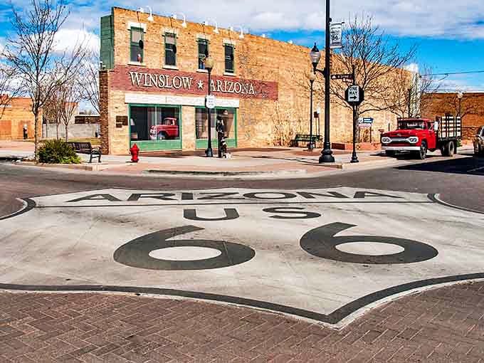 Standing on the corner in Winslow, Arizona? This famous Route 66 spot turns Eagles lyrics into reality, complete with a vintage red truck.