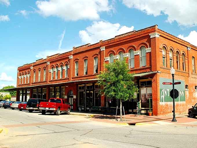 Red brick beauty with arched windows that have watched generations pass by, still standing strong and stunning.