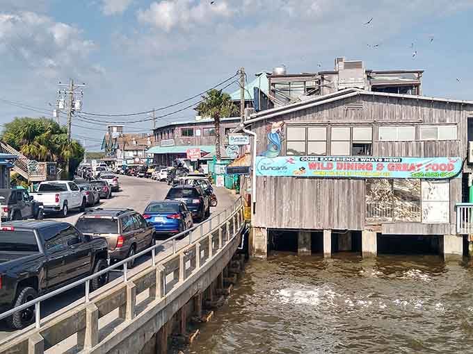 Weathered docks and working boats create an authentic fishing village vibe that no theme park could ever replicate perfectly.