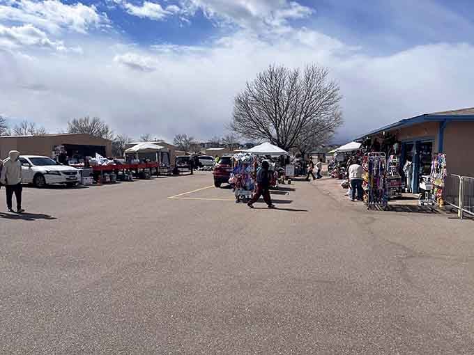 Outdoor vendors spread their wares under dramatic clouds, turning shopping into a genuine Rocky Mountain adventure.