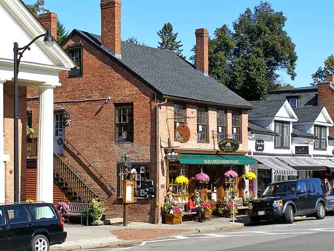 Brick storefronts adorned with cheerful flower baskets line streets where Revolutionary War heroes once walked these very sidewalks.