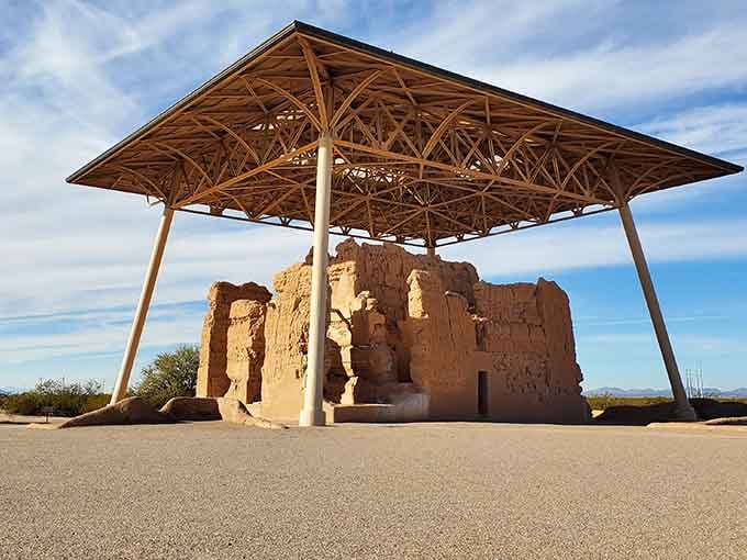That modern canopy protecting 700-year-old craftsmanship is like putting a carport over the Sistine Chapel, but necessary.