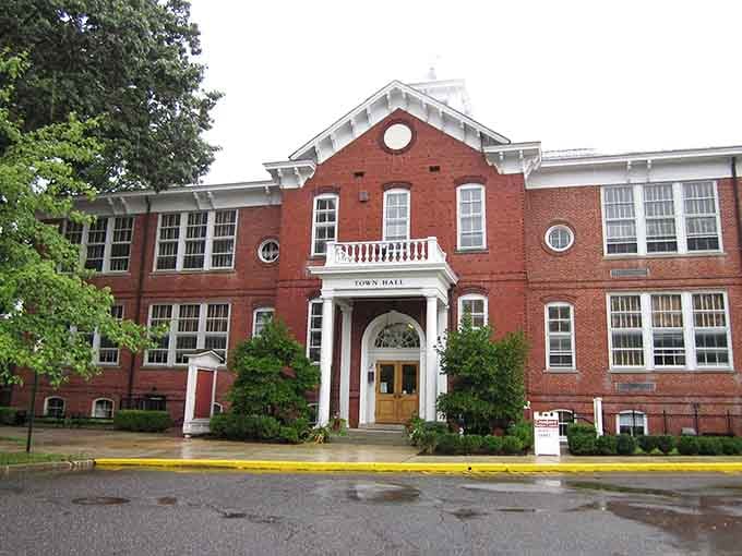 Cranbury's stately Town Hall commands attention with its elegant columns and timeless red brick that architects dream about.