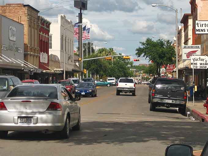 Those flags flying high tell you this is a community that values tradition, neighbors, and a good cup of coffee.