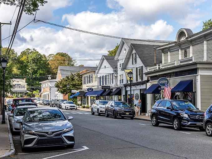 Those blue awnings and patriotic flags tell you this is a town that knows exactly who it is.