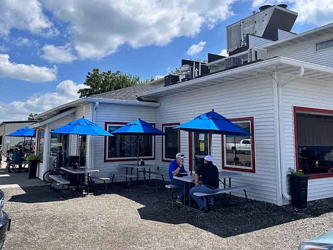 Those bright blue umbrellas aren't just for show &ndash; they're sheltering some of Iowa's most delicious burgers from the prairie sun.