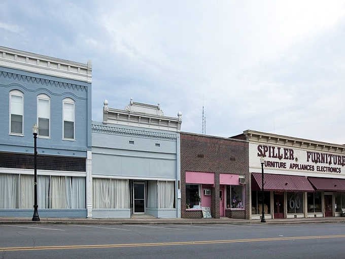 Spiller Furniture stands as a testament to Greensboro's enduring small-town economy, where local businesses still thrive on Main Street.