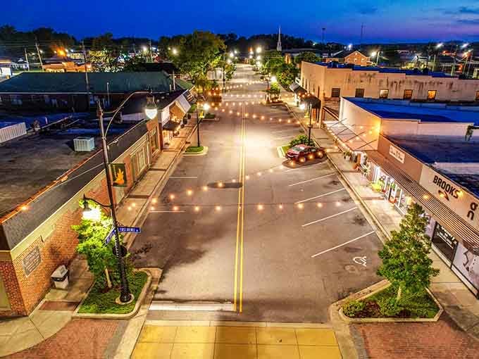 The evening glow turns ordinary streets into extraordinary scenes worthy of a postcard from simpler times.