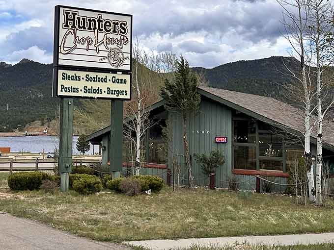 When the sign lists steaks, seafood, and game with mountain peaks behind it, you know you've found something special.