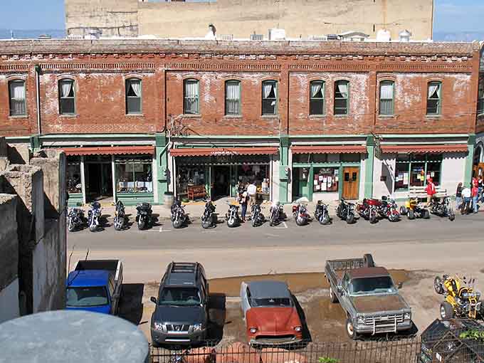 Motorcycles parked beneath century-old brick facades tell you this town attracts folks who appreciate authentic character and history.