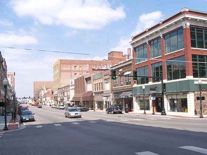 Historic storefronts line Joplin's main street, where affordable living meets small-city convenience.