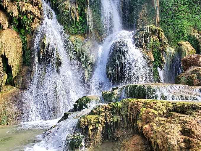 The moss-covered rocks and multiple streams make this feel like discovering a fairy tale waterfall.