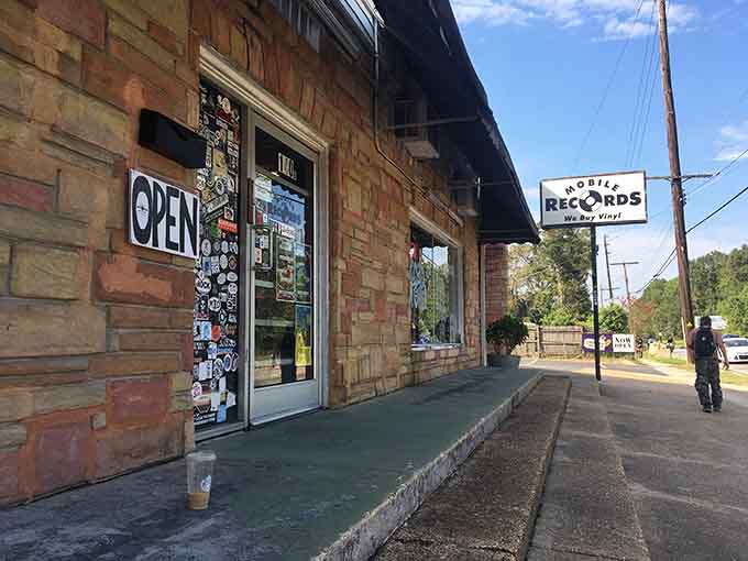 When the "OPEN" sign beckons from a sticker-covered door, you know serious collectors have left their mark here.