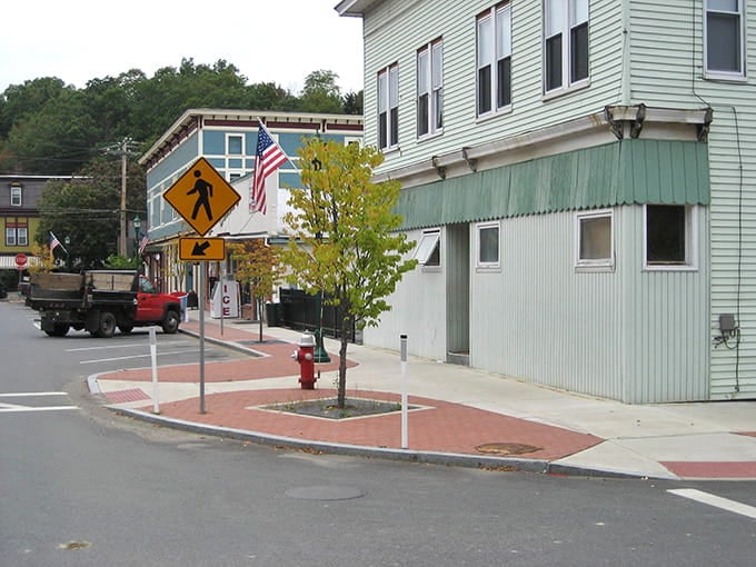 Tree-lined intersections and American flags remind you that Norman Rockwell wasn't making it all up.