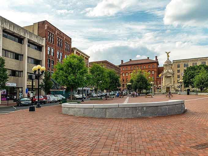 Downtown's brick plaza invites you to slow down and breathe, surrounded by trees and architecture that whispers of simpler times.