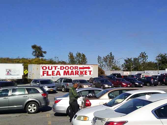 That bold red sign practically shouts "come find your next great deal" across the sunny parking lot.
