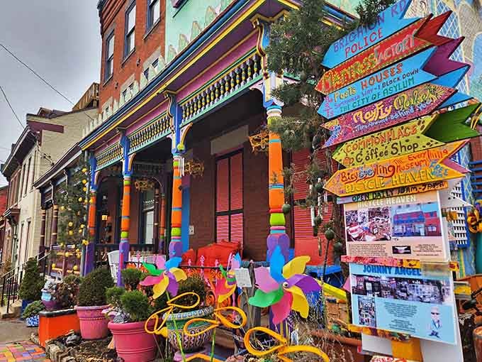 Rainbow stripes and whimsical sculptures transform an ordinary street corner into Pittsburgh's most photographed happy place ever.