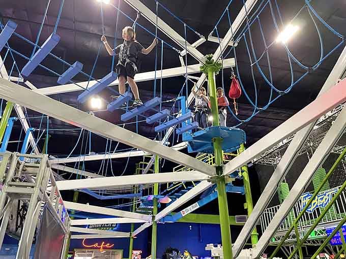 Inside Sawyer's, this towering rope course looks like something from American Ninja Warrior, only way more colorful and fun.