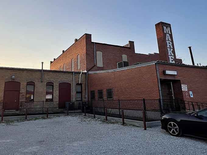 The historic Smitty's Market at dusk – where BBQ pilgrims have been worshipping at the altar of smoke for decades.