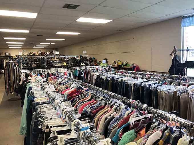Row after organized row of clothing waiting to tell their next story in someone's closet.