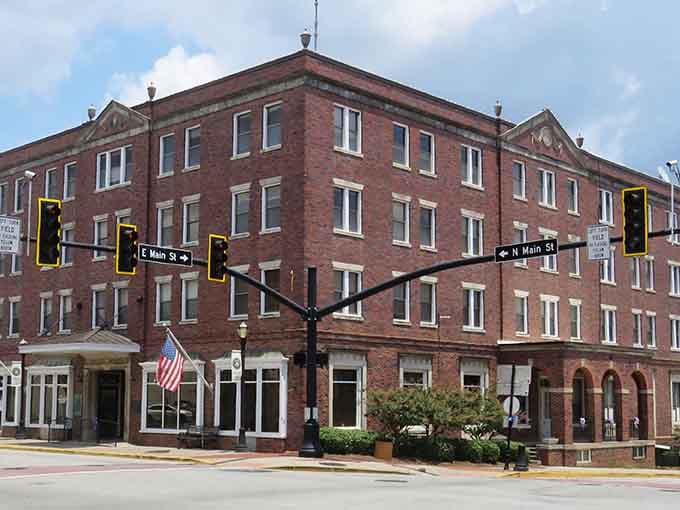 This stately brick hotel building has seen more stories unfold than your favorite soap opera over the decades.