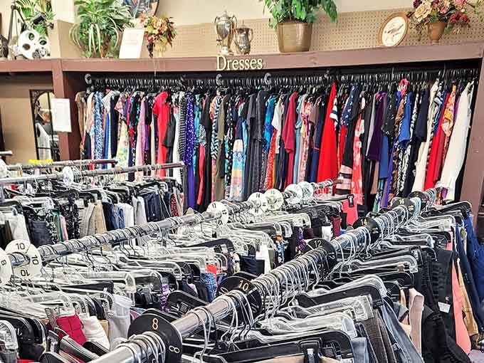 Rows of dresses hang like a carefully curated collection, each one waiting to tell its next story.