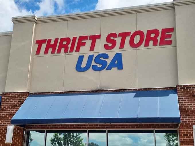 The bold red and blue lettering announces bargains loud enough for everyone in the parking lot to hear.