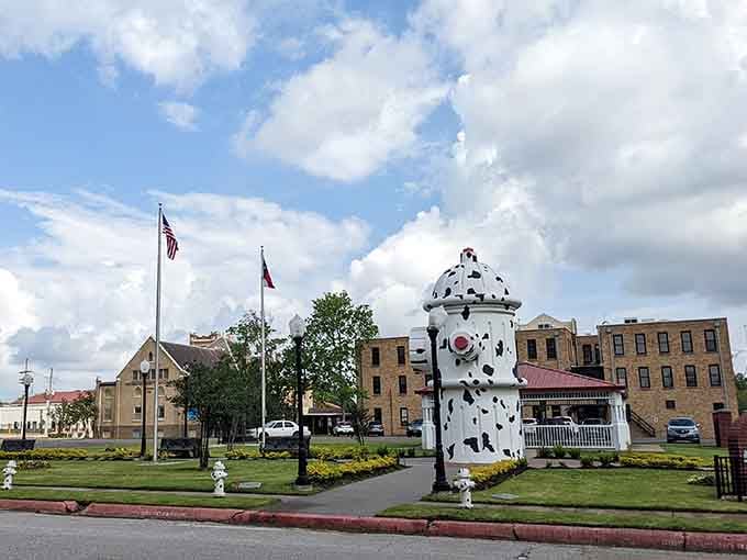 The massive working hydrant towers above visitors, proving that firefighting equipment can absolutely be larger than life itself.