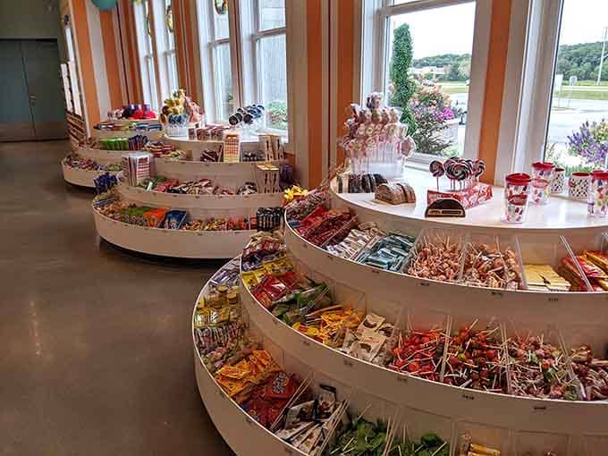Those curved display shelves hold more varieties of sweetness than you knew existed in one place.