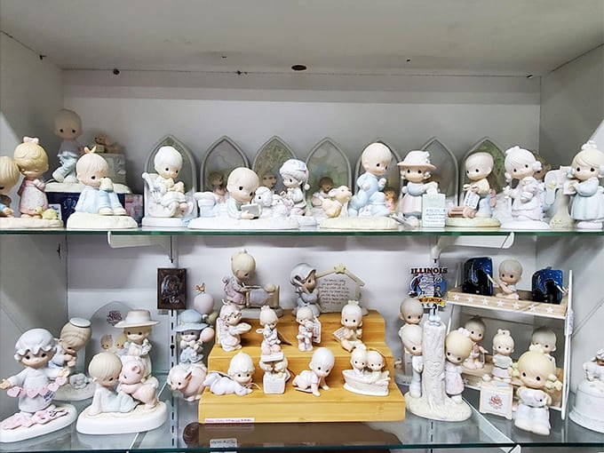 Precious Moments figurines assembled like a porcelain army, ready to trigger someone's childhood memories instantly.