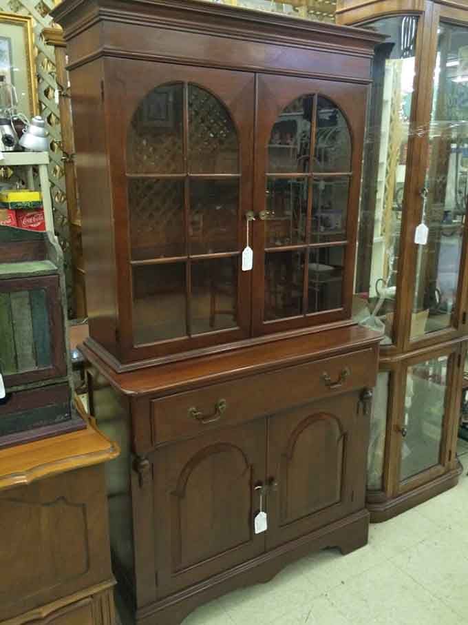 This stunning china cabinet has witnessed more family dinners than your grandmother's dining room table.