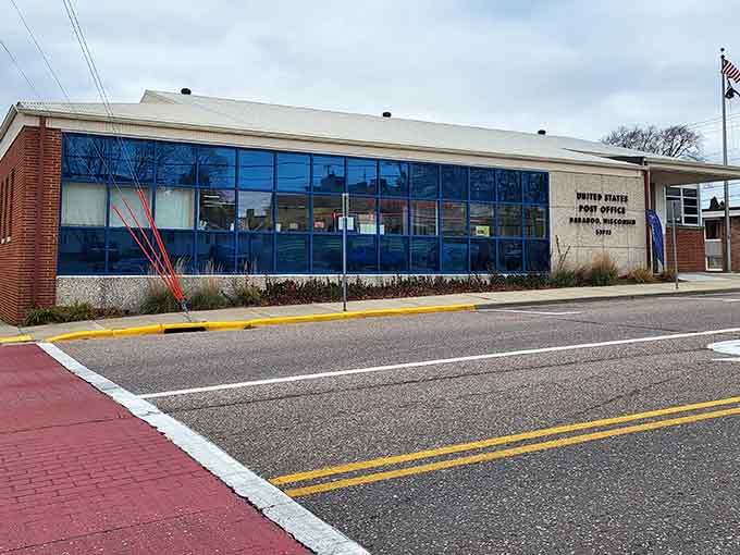 The modern post office blends seamlessly into Baraboo's historic streetscape, where even federal buildings respect the town's character.