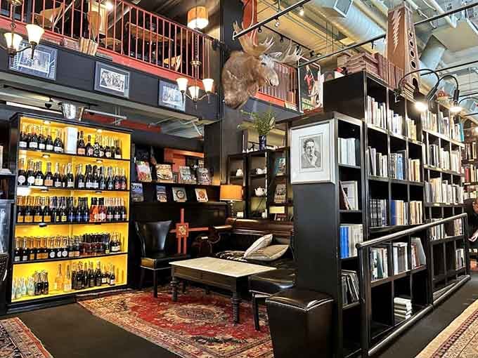 Floor-to-ceiling shelves meet glowing champagne displays in this bibliophile's dream come true.