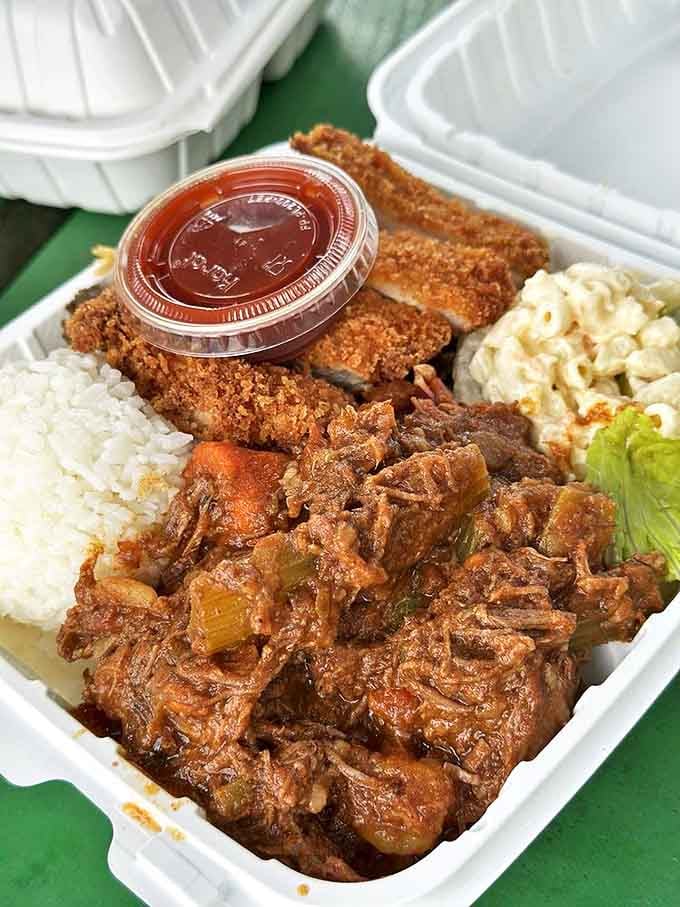The holy trinity of Hawaiian comfort food: perfectly crispy chicken katsu, tender beef stew, and two scoops of rice that somehow make everything better.