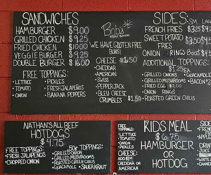 Behold the chalkboard of infinite possibilities, where your perfect burger awaits construction like edible architecture.