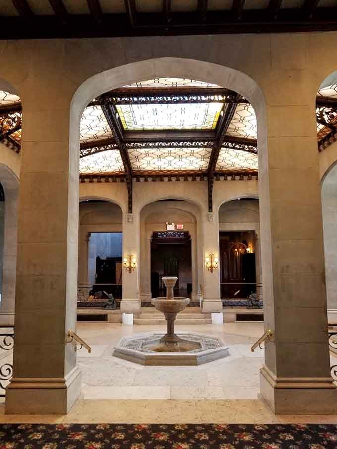 That courtyard fountain whispers elegance louder than your neighbor's leaf blower screams on Saturday mornings.