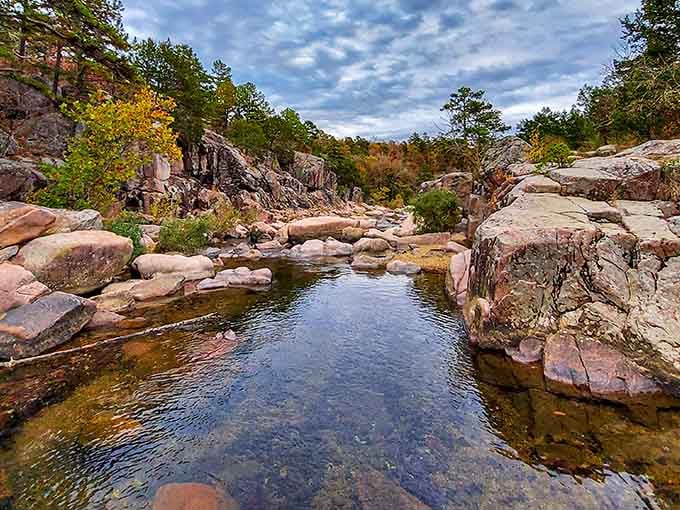 Nature carved its masterpiece at Castor River Shut-Ins, where crystal waters wind through ancient pink granite &ndash; Missouri's natural spa experience.