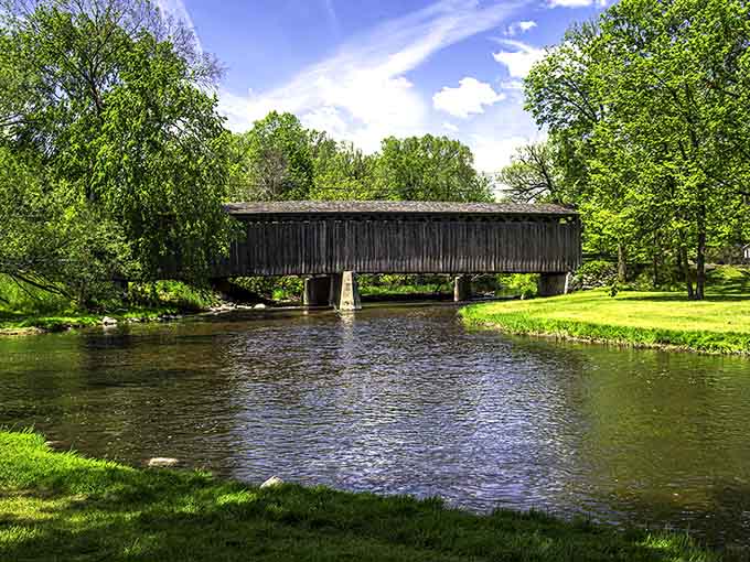 Wisconsin's last covered bridge standing proud, proving some things are worth preserving no matter what century we're in.