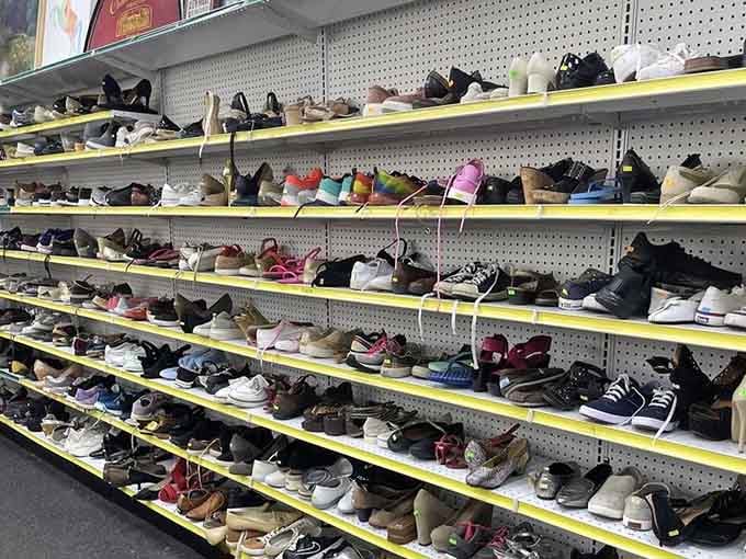 From sneakers to stilettos, this wall of footwear proves that Cinderella wasn't the only one who deserved options.