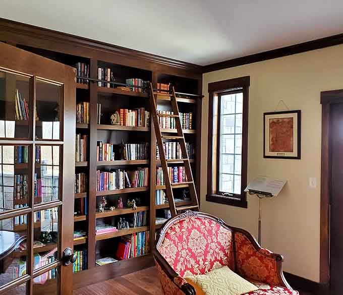 Every proper castle needs a library with a rolling ladder, preferably for dramatic entrances during book club.
