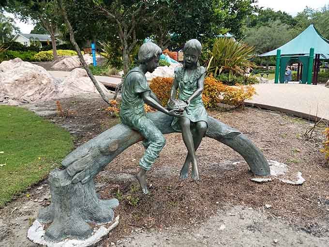 These bronze sculptures capture the pure essence of childhood friendship, frozen in a moment of shared joy.